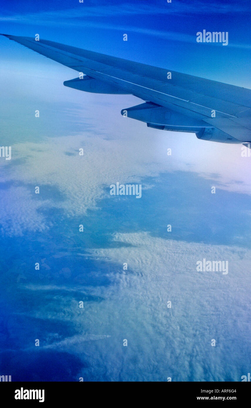 Airplane Wing and Clouds over the Atlantic Ocean Stock Photo - Alamy