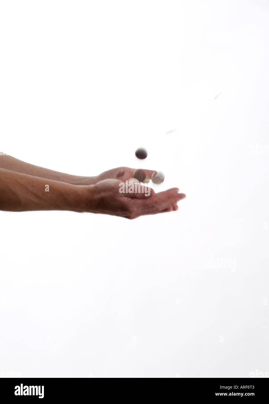 Coins leaving hands Stock Photo - Alamy