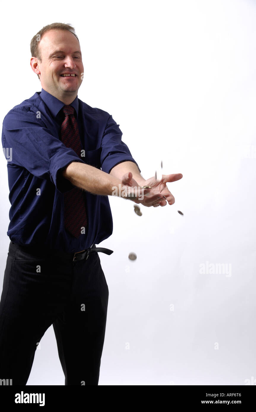 Man catching falling coins hi-res stock photography and images - Alamy