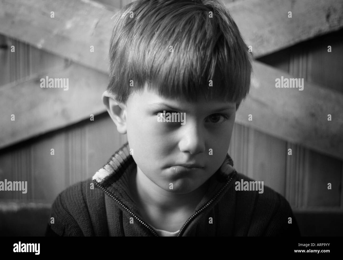 Child pouting looking unhappy Stock Photo - Alamy