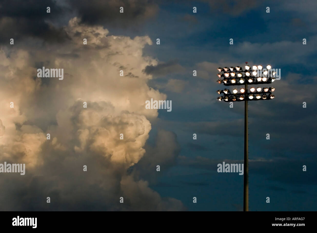 Lights and thunderstorm baseball field Stock Photo - Alamy