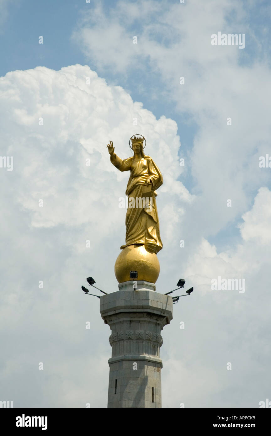 The Virgin Mary statue at the entrance to the port of Messina at ...