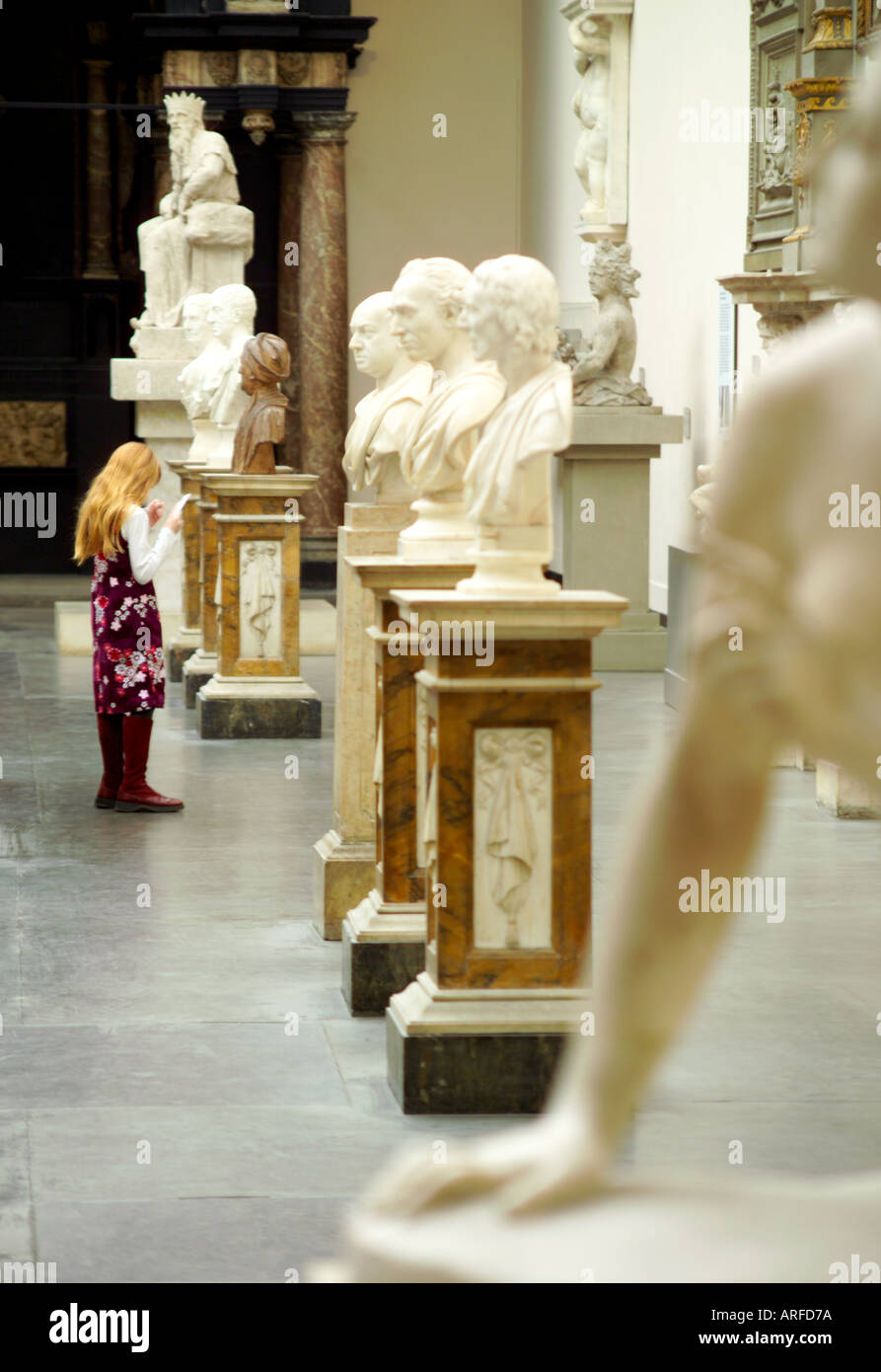 little girl looking at statues in V A museum Stock Photo - Alamy