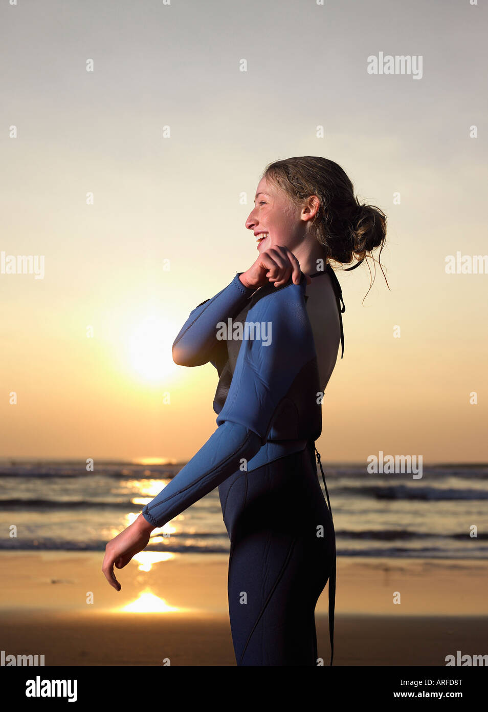 Portrait of a female surfer Stock Photo - Alamy