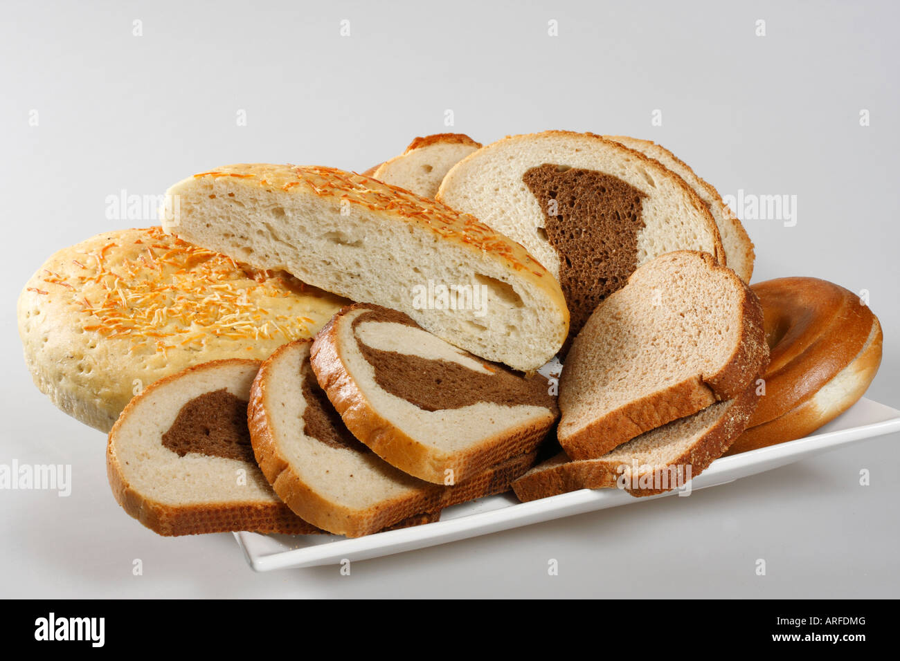 Closeup of American sliced bread loaf with Focaccia on a plate nobody ...