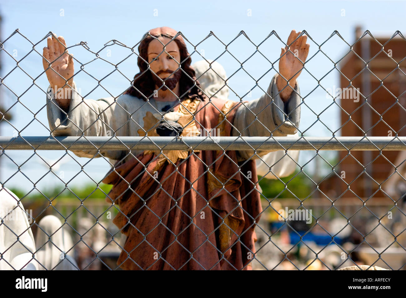 Jesus statue behind fence hi-res stock photography and images - Alamy