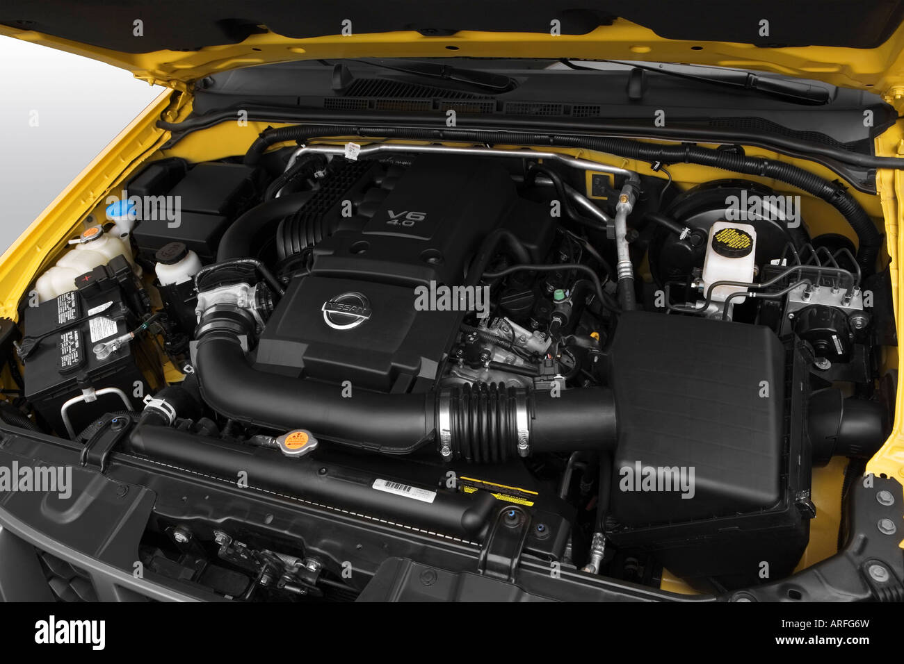 2007 Nissan Xterra Off Road in Yellow - Engine Stock Photo - Alamy