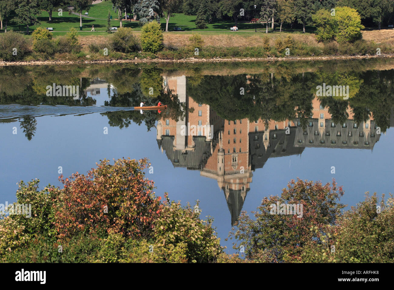 Canoeists in reflection of Delta Bessborough Hotel Stock Photo - Alamy