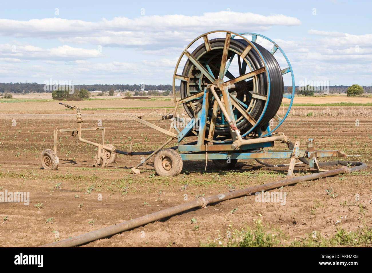 Farm irrigation hose on roll Stock Photo - Alamy