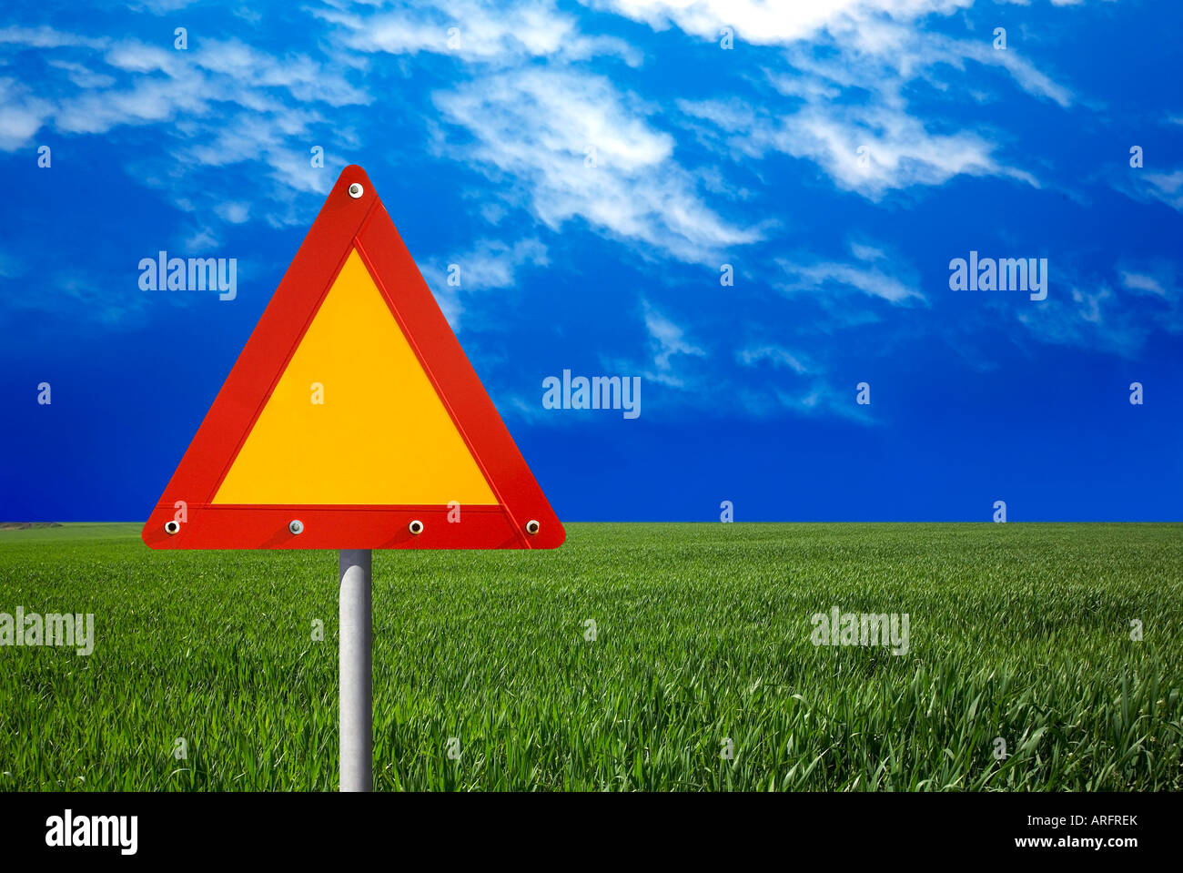Landscape and empty triangle sign Stock Photo - Alamy