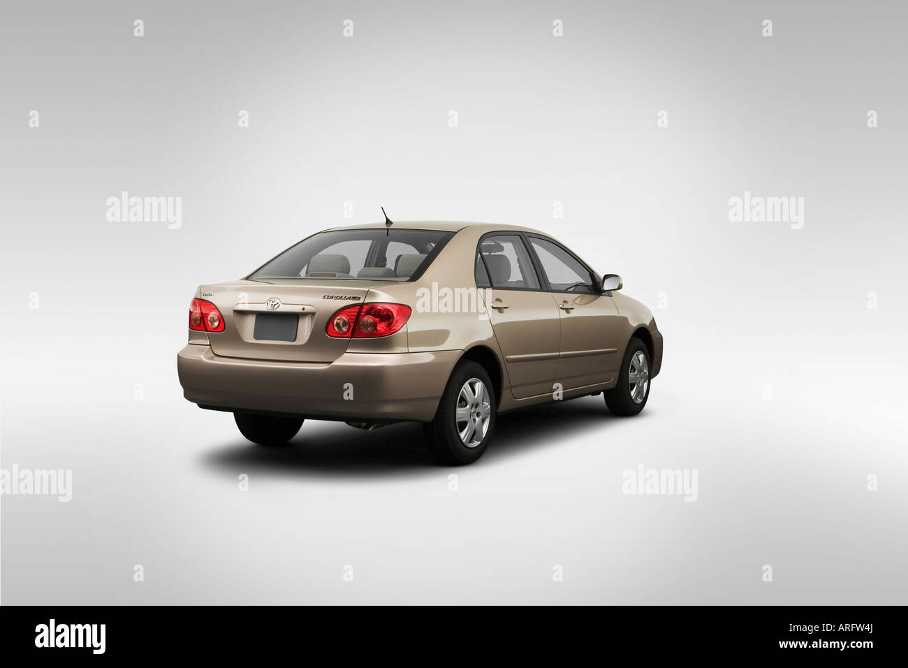 2008 Toyota Corolla LE in Beige - Rear angle view Stock Photo - Alamy