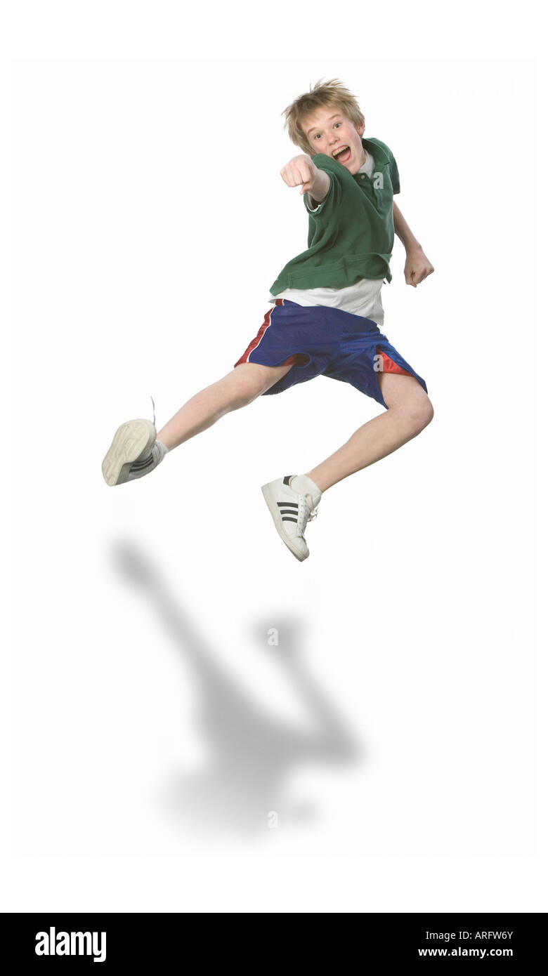 teen boy jumping with enthusiasm Stock Photo - Alamy