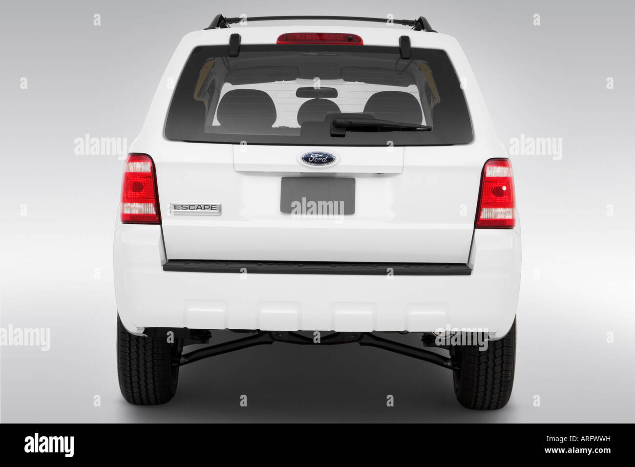 2008 Ford Escape XLS in White - Low/Wide Rear Stock Photo - Alamy