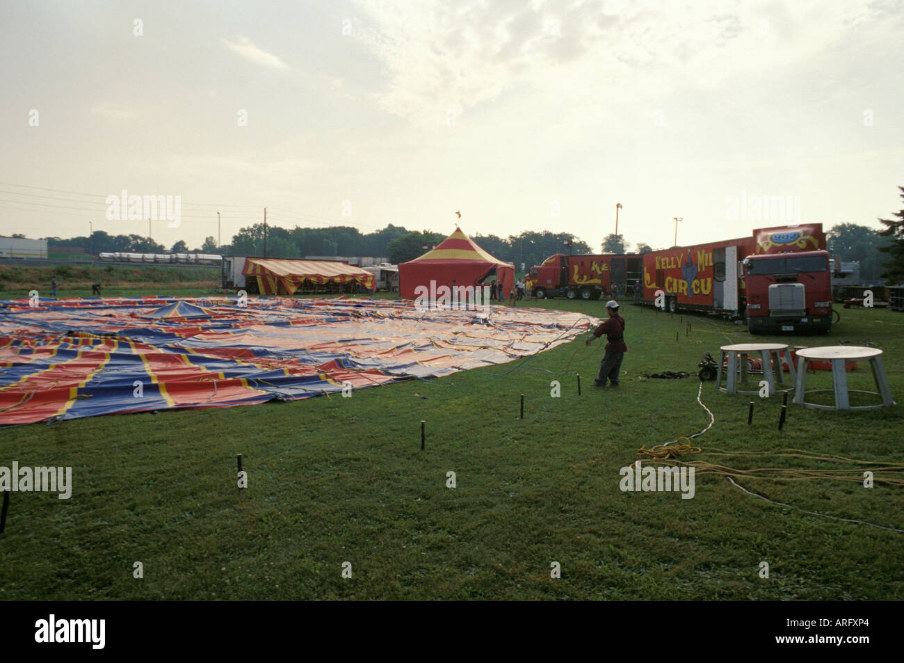 Kelly Miller Circus USA America American roustabout lays out canvas big ...