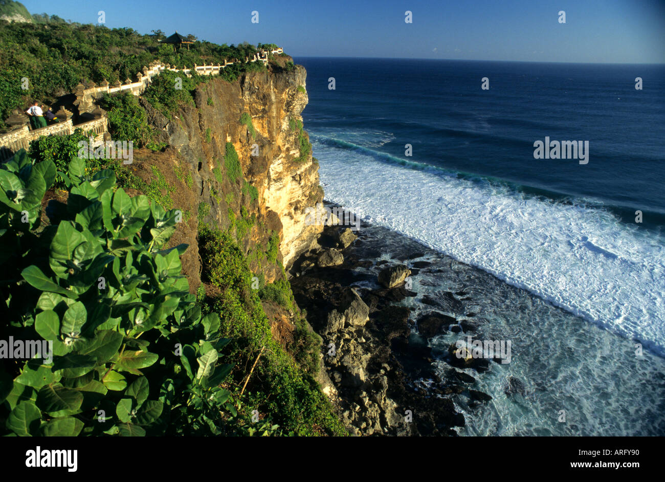 Bali Blue water beach shore coast shoreline people Stock Photo - Alamy