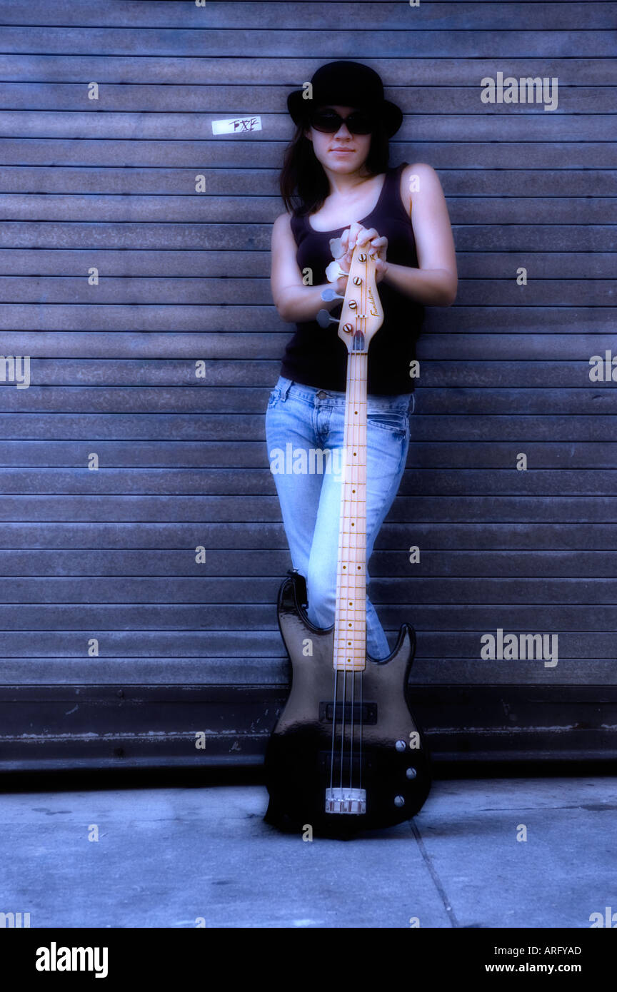 Female Blues Bass Guitarist Stock Photo - Alamy