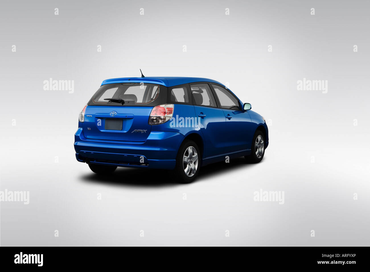 2008 Toyota Corolla Matrix XR in Blue - Rear angle view Stock Photo - Alamy