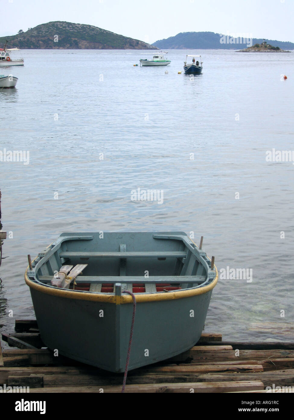 Empty rowing boat Skiathos Greece Stock Photo - Alamy