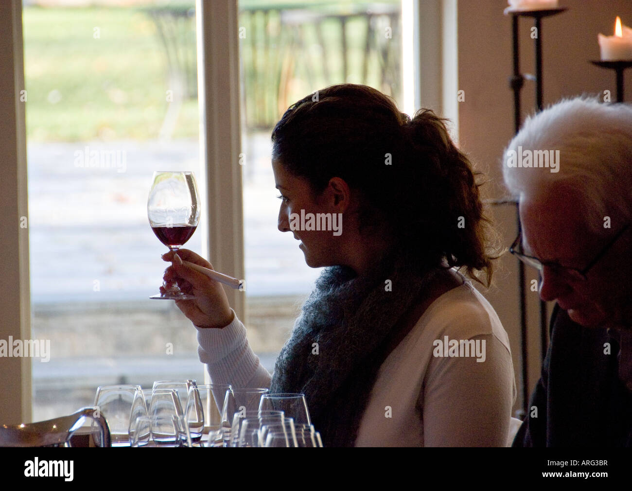 Group of people tasting red wine Stock Photo - Alamy