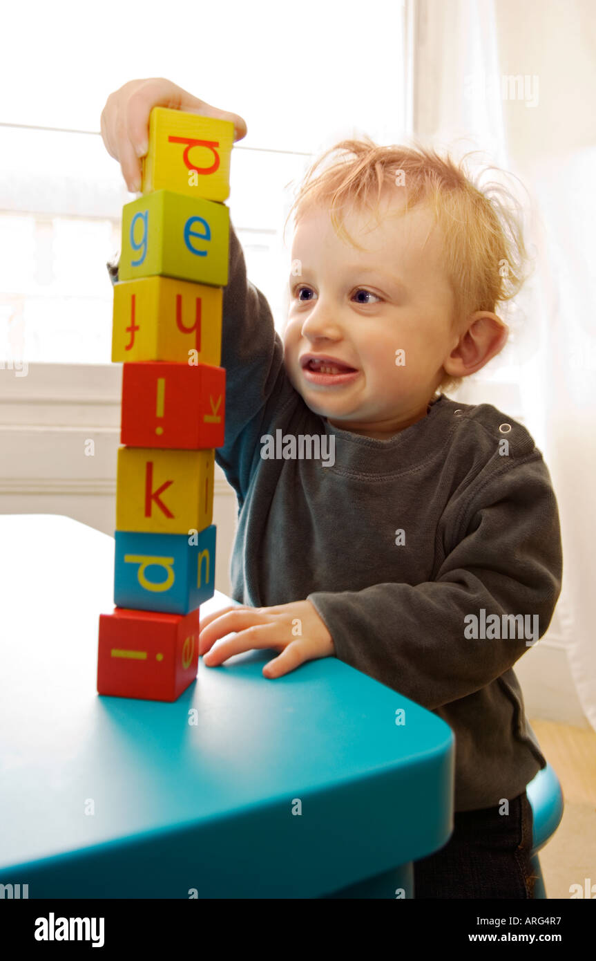 Toddler building tower hi-res stock photography and images - Alamy