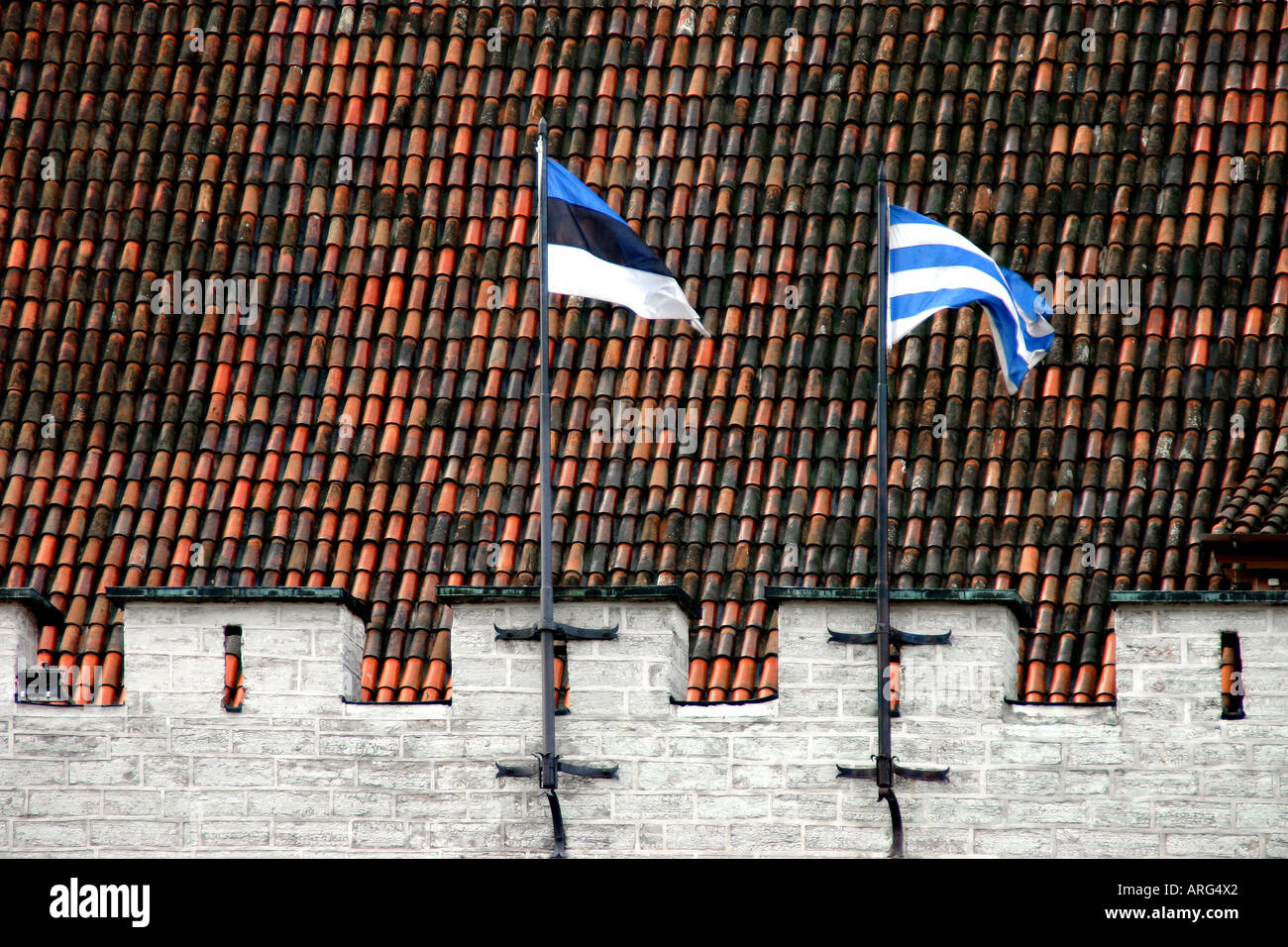 The Tallinn and Estonian flags flying above the Town Hall in Tallinns ...