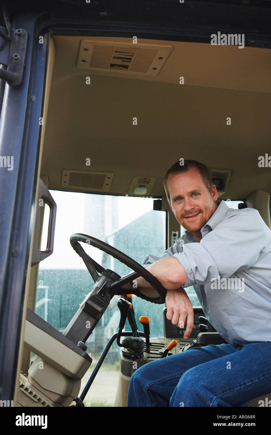 Farmer Posing With Tractor High Resolution Stock Photography and Images ...