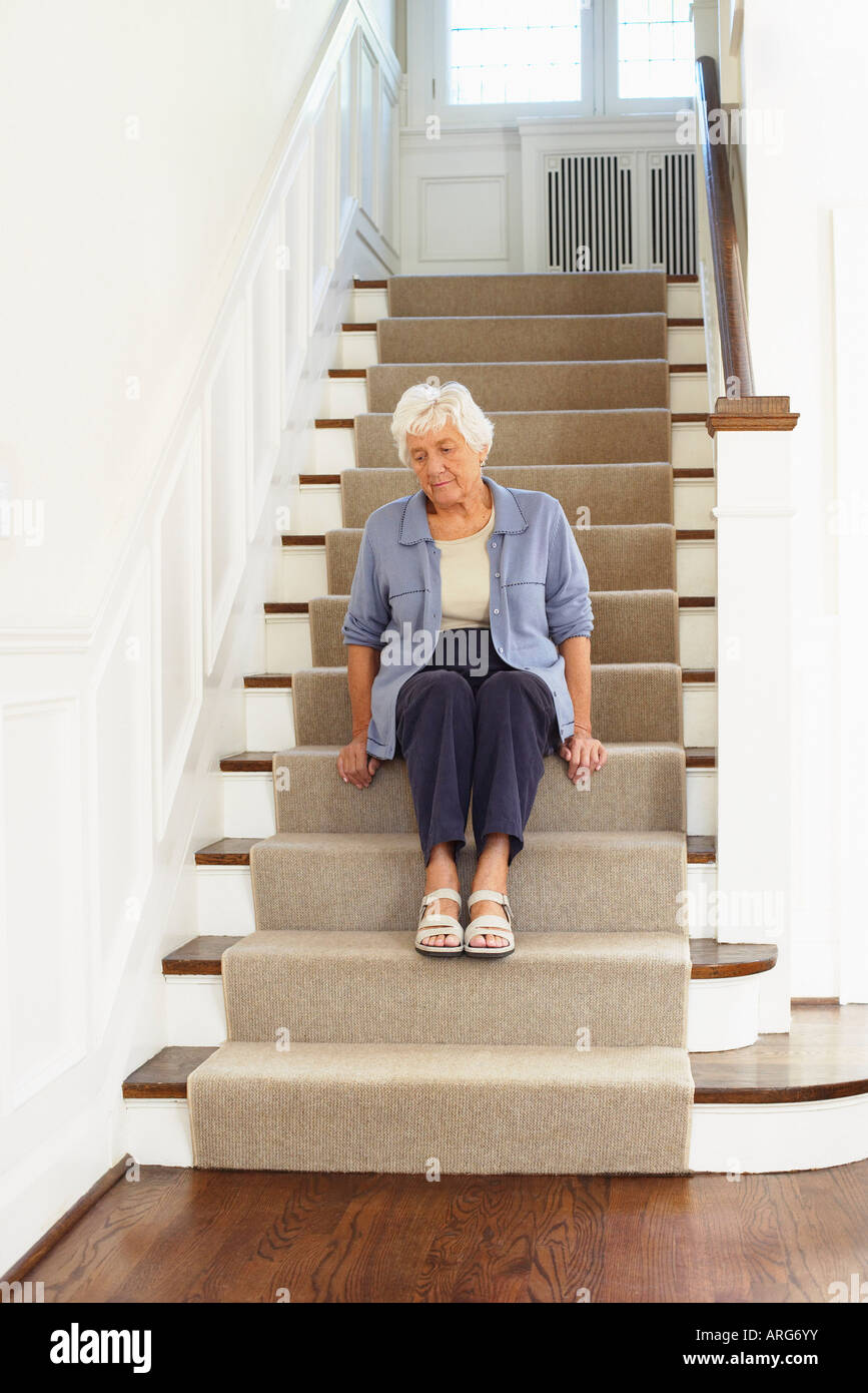 Elderly Woman Sitting On Stairs High Resolution Stock Photography and ...