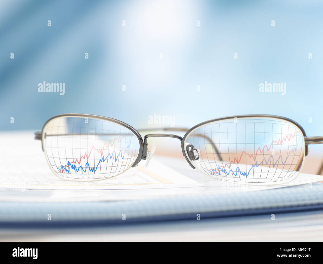 Eyeglasses and Line Graph Stock Photo - Alamy