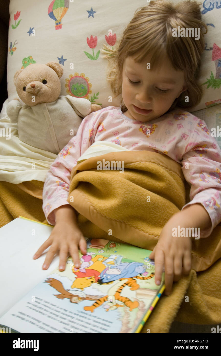 A girl read a story Stock Photo - Alamy