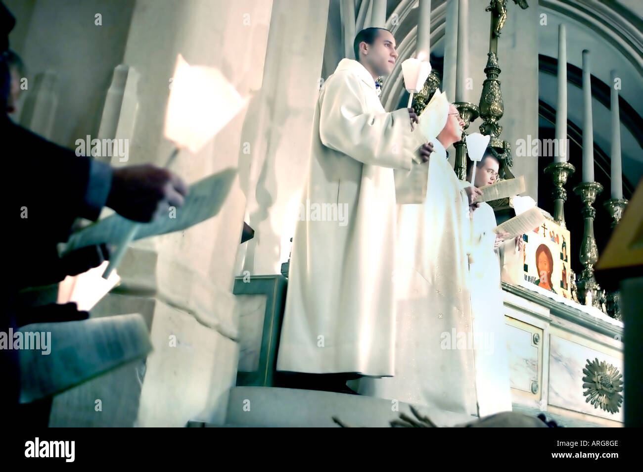 Christmas in Paris France, Catholic Religion Priests Serving "Midnight ...