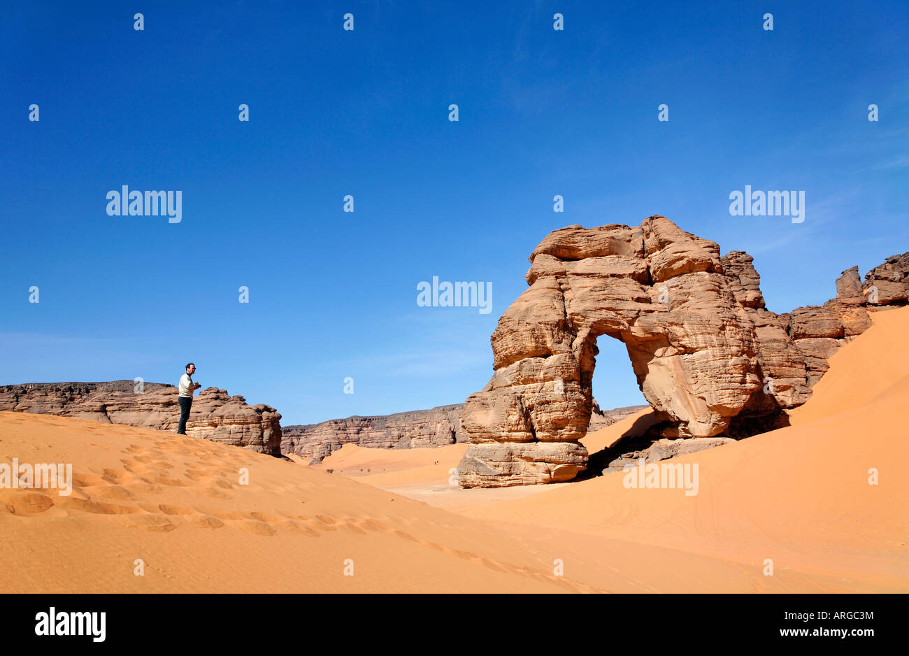 Natural arch rock formation in the Akakus Mountains Libya Stock Photo ...