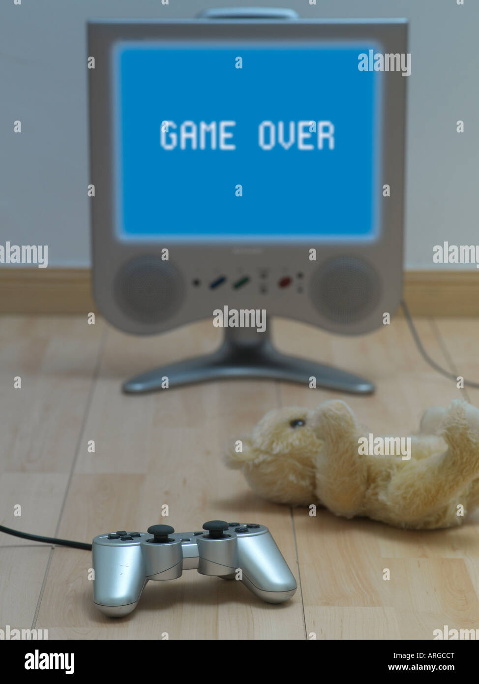 Still Life of Teddy Bear and Video Game Stock Photo - Alamy