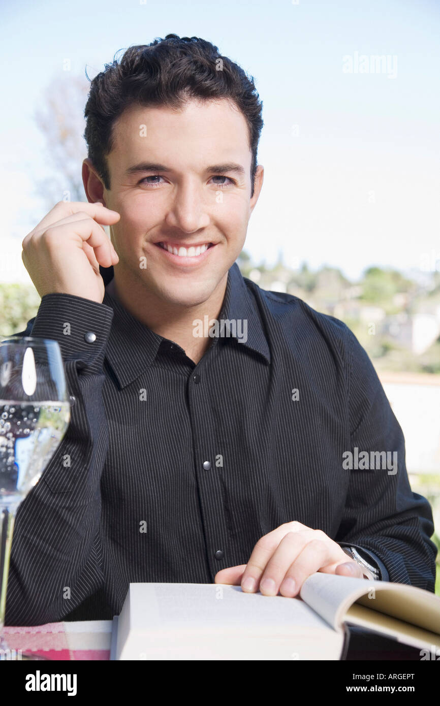 Portrait of Man with Book Stock Photo - Alamy