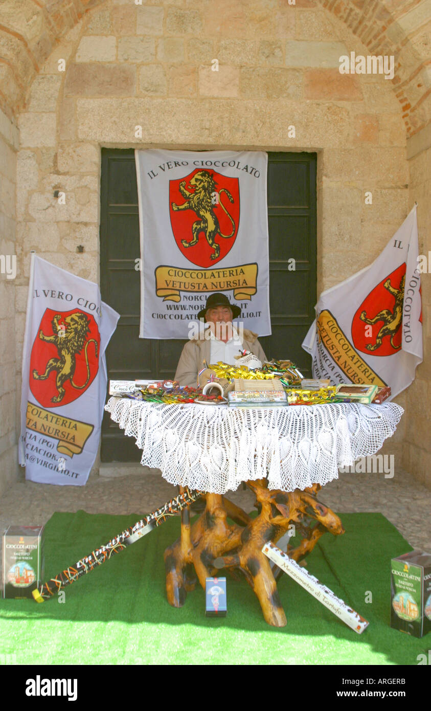 Selling locally made chocolate at a festa in the Gourmet Umbrian town ...
