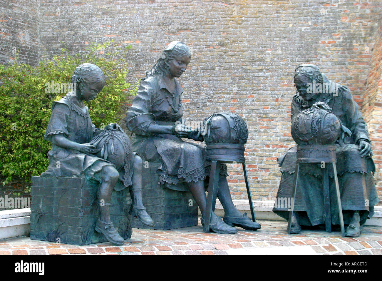 Group of lacemakers statue honours the tradition of pillowlacemaking by ...