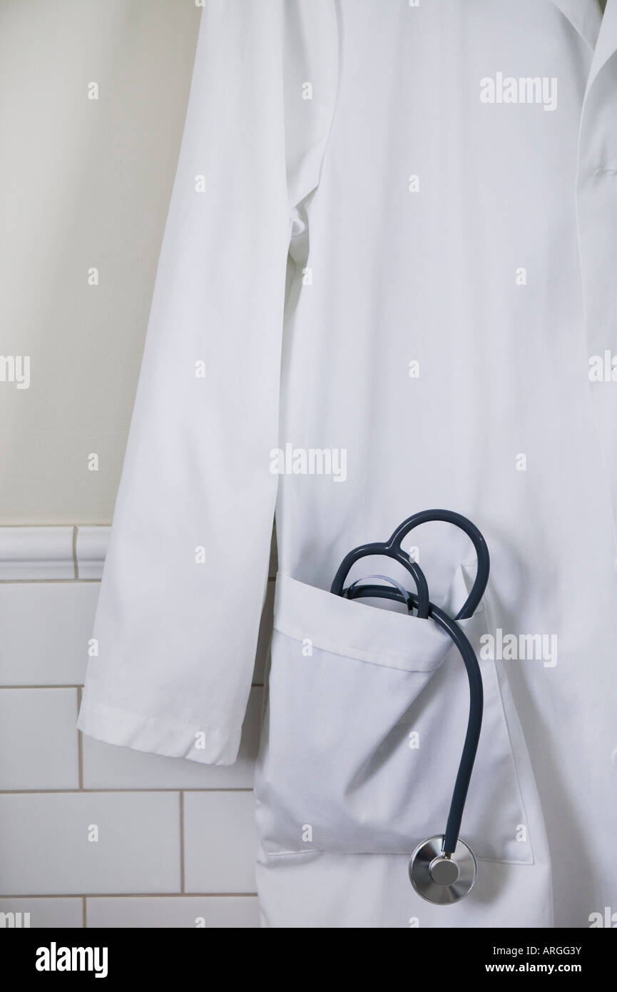 White lab coat hanging up hi-res stock photography and images - Alamy