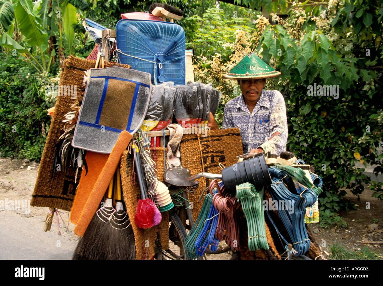 Bali Indonesia Hawker bike bicycle man Indonesian Stock Photo - Alamy