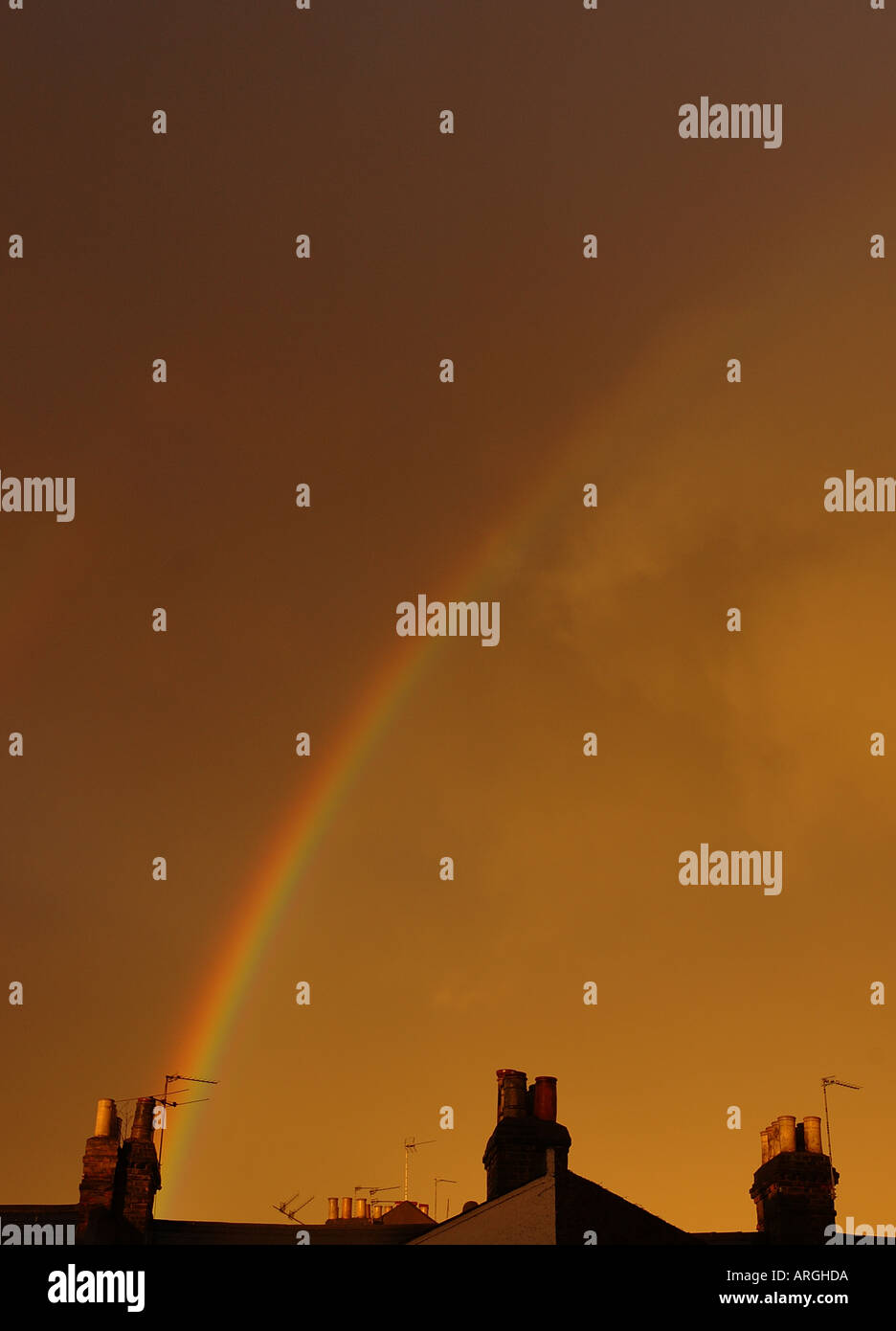 Rainbow over the rooftops of old Victorian houses in Central London ...
