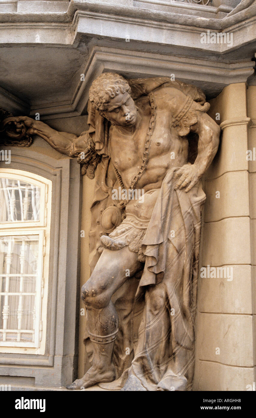 One of the statues of Moors which support the balcony of the Baroque ...