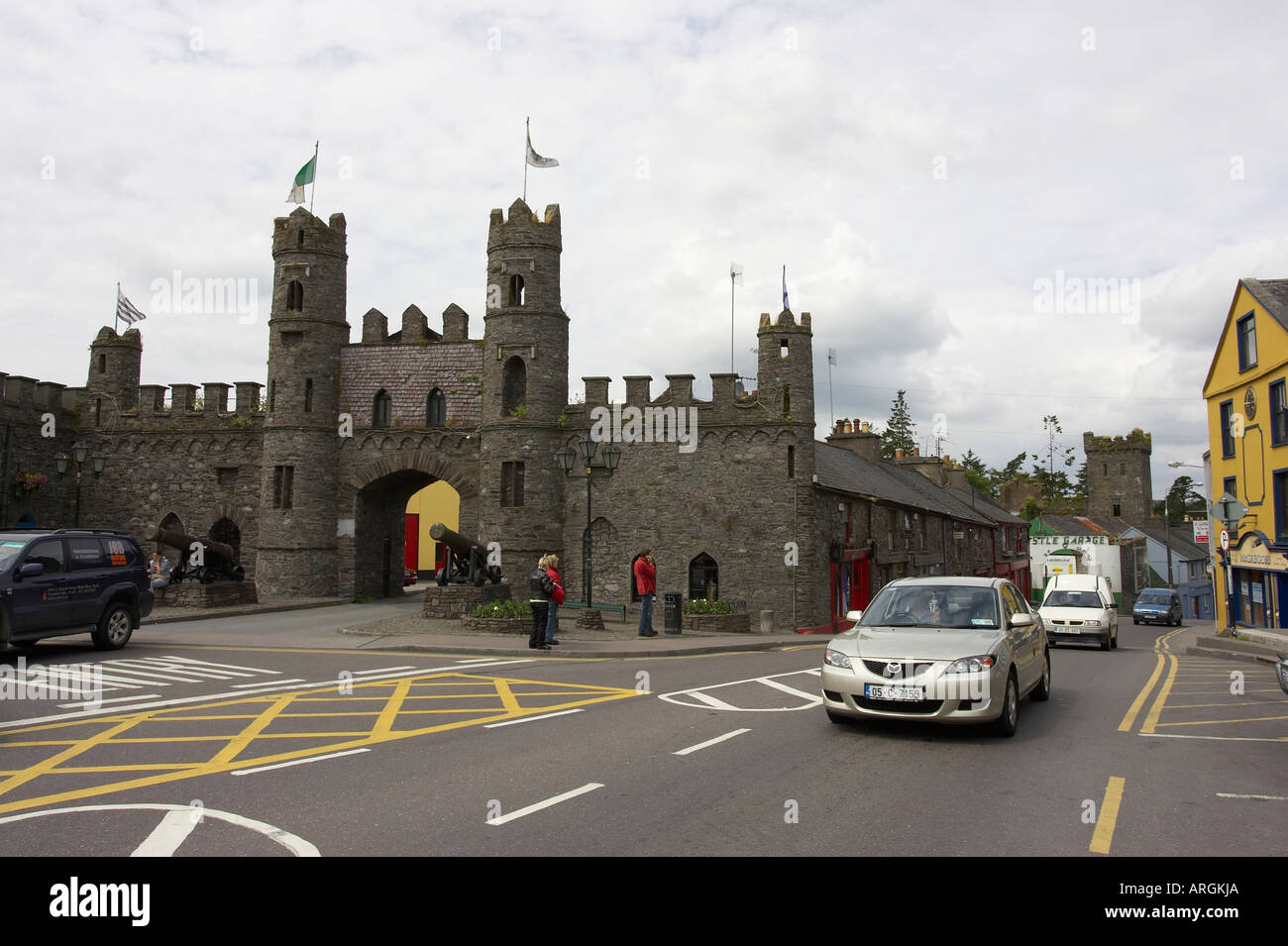 modern traffic driving past Entrance to Macroom Castle County Cork ...