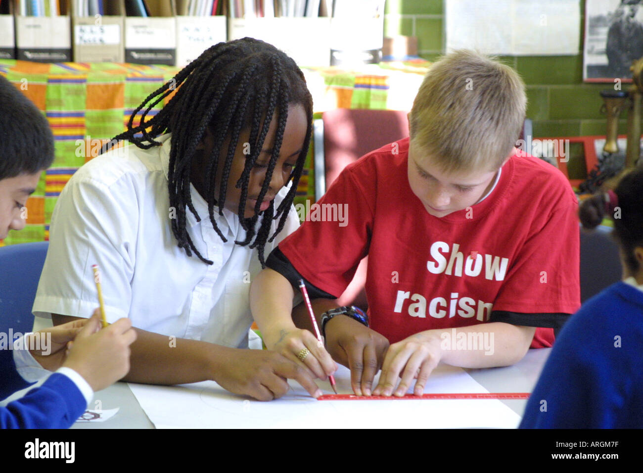 Primary classroom with children working on maths Stock Photo - Alamy