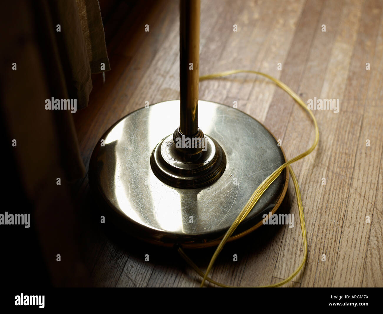 Close-up of Lamp Base and Hardwood Floor Stock Photo - Alamy