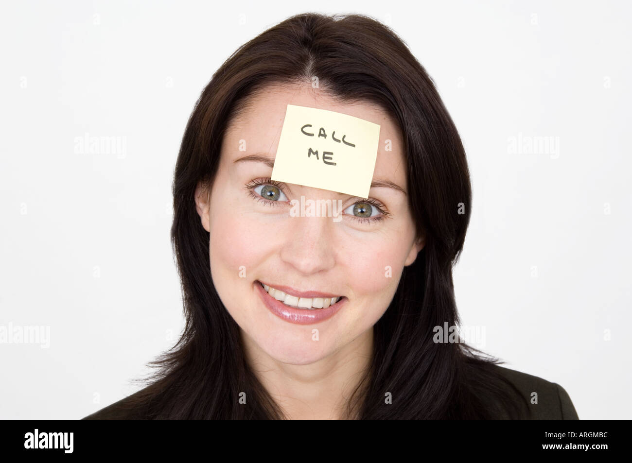 woman with post it note on her head with call me on it Stock Photo - Alamy