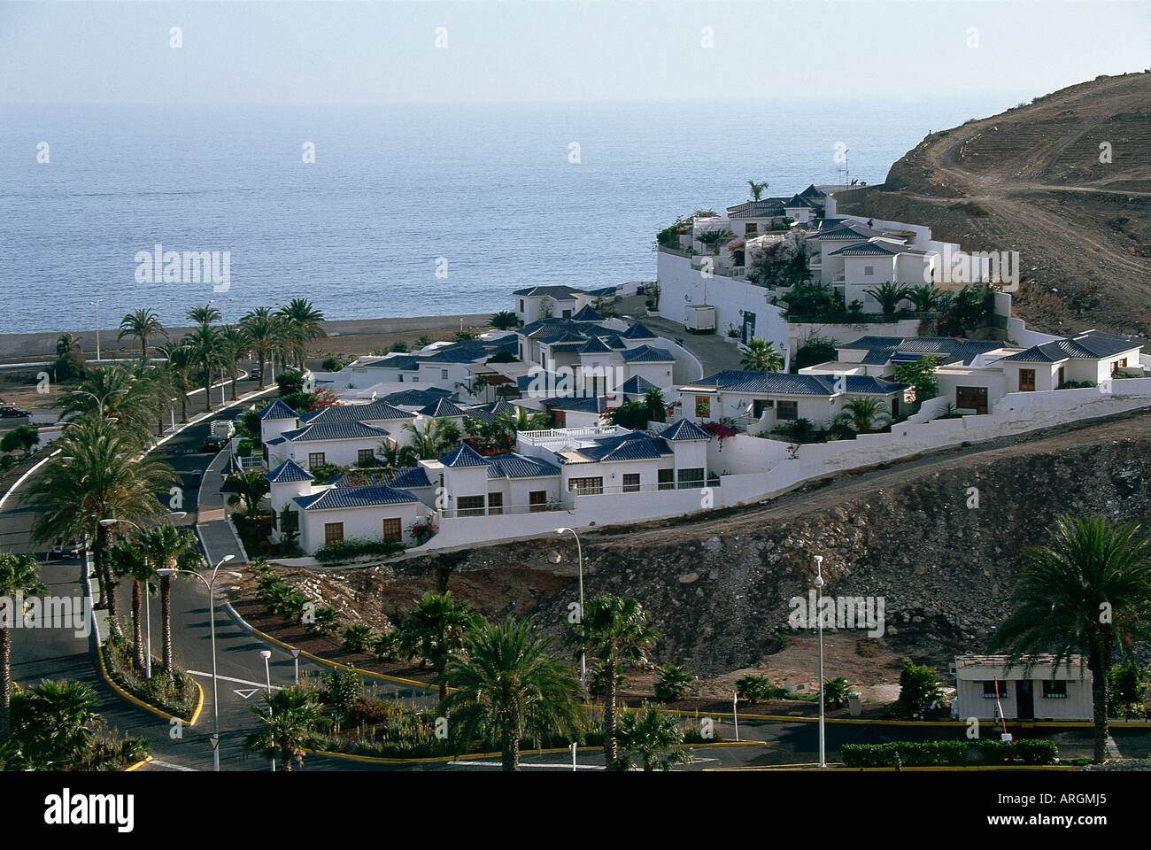 An attractive housing development of grey roofed buildings with ...