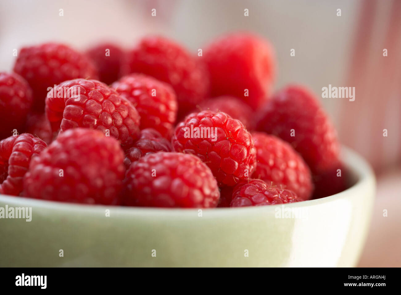 Bowl of Raspberries Stock Photo - Alamy