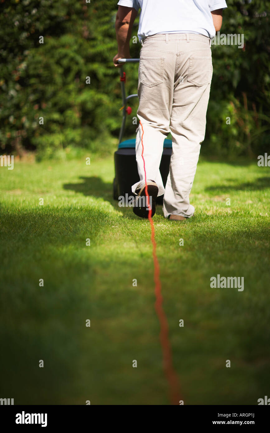 Back view man lawnmower High Resolution Stock Photography and Images ...