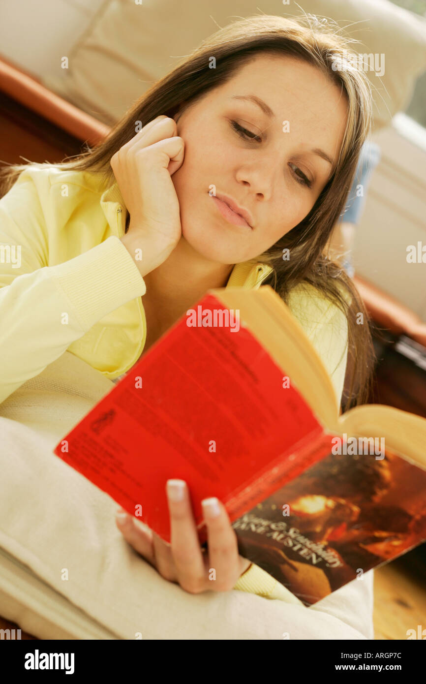 Girl reading book Stock Photo - Alamy