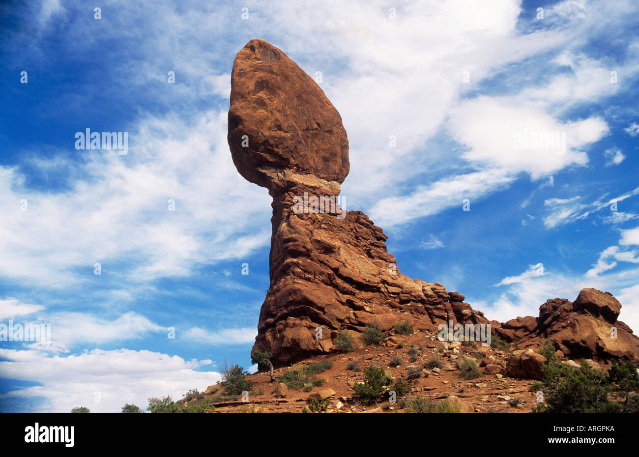 A huge rock balanced atop one of the naturally twisted pinnacles one of ...