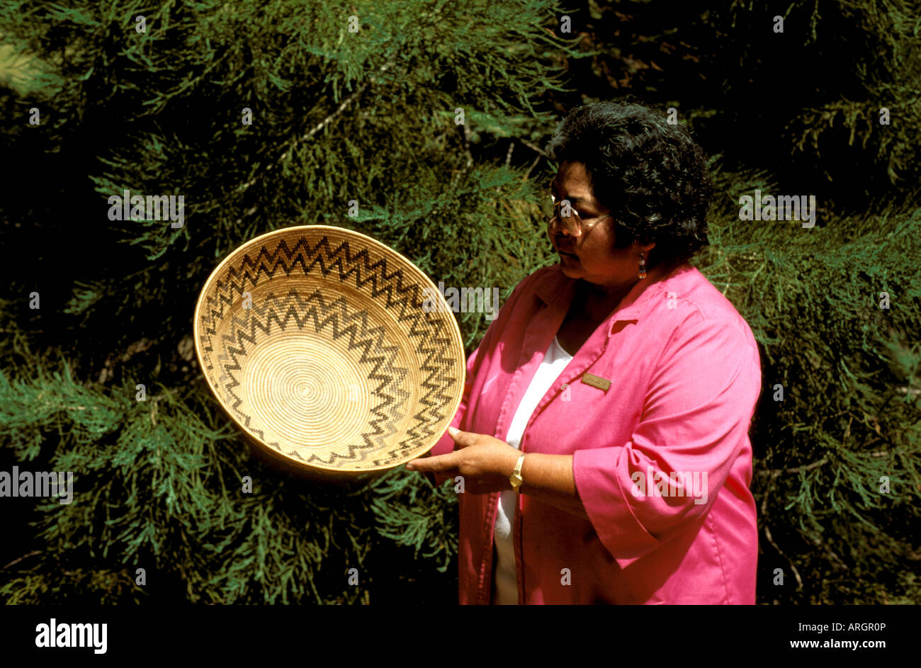 Native American Clara Charlie displays a Yokut basket at Sequoia Kings ...