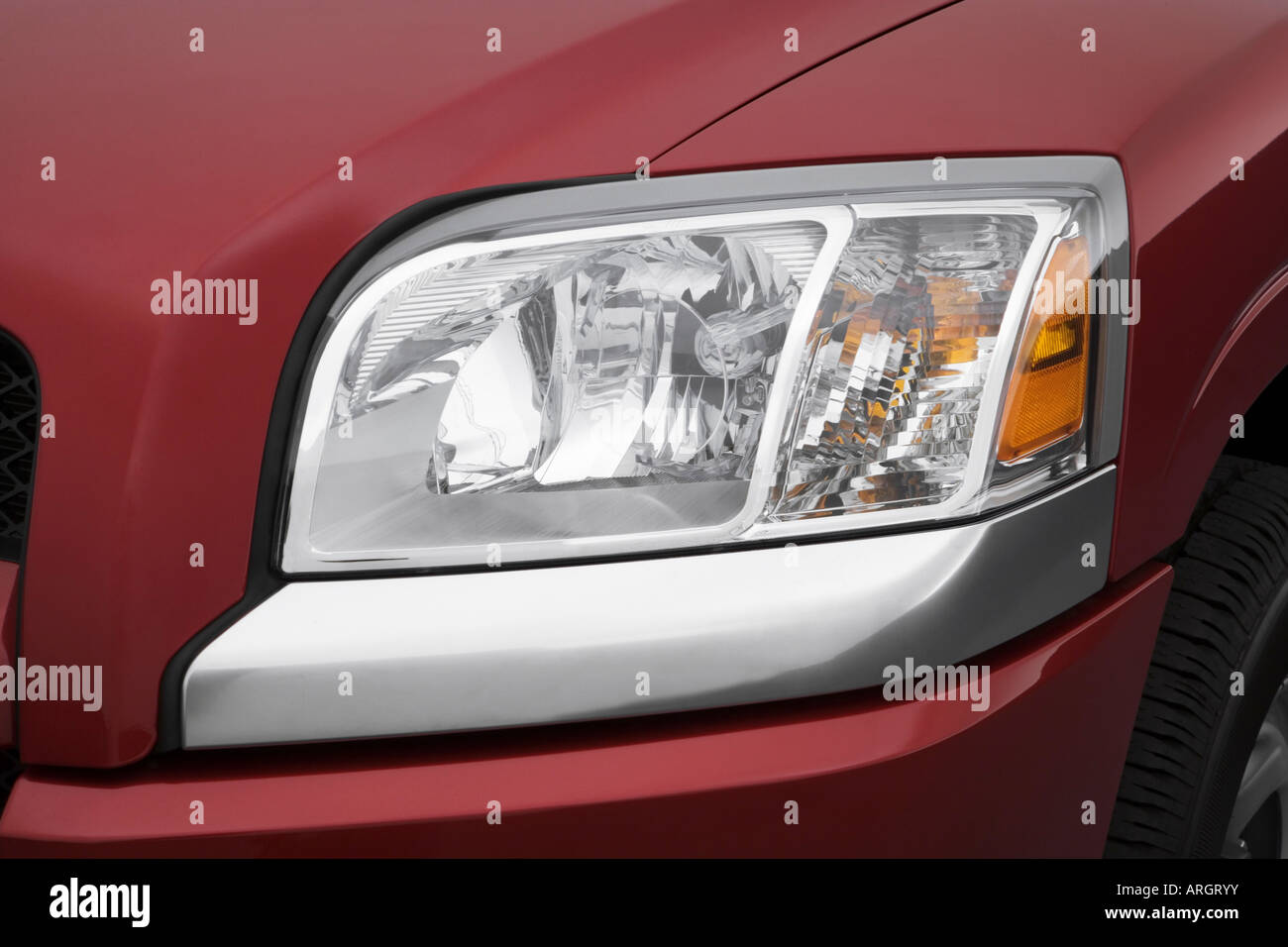 2007 Mitsubishi Raider LS in Red - Headlight Stock Photo - Alamy